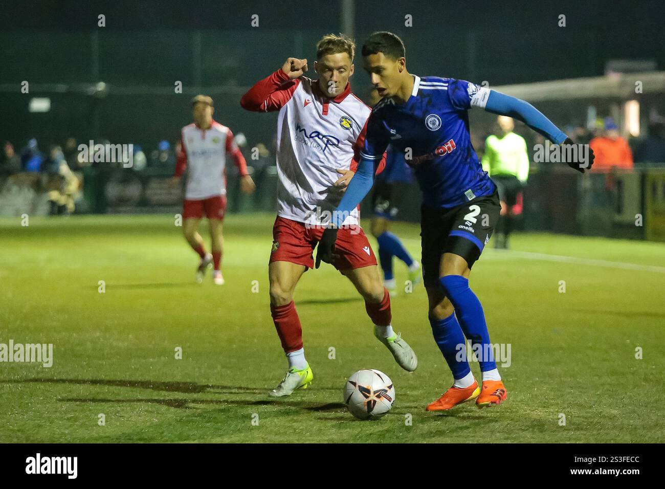Kyron Gordon of Rochdale and Kevin Hayes of Stockton Town in action ...