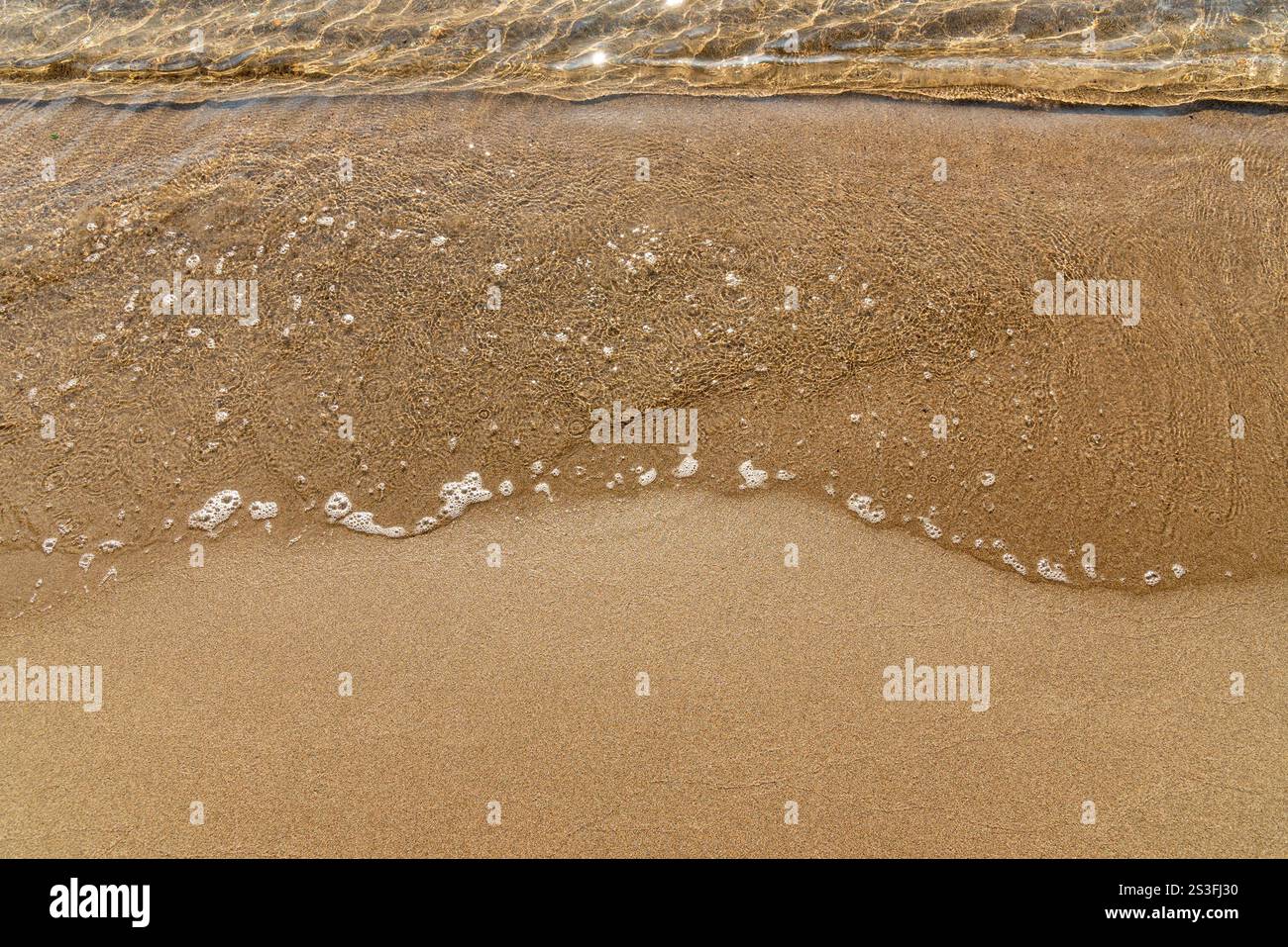 Sandy yellow beach with sea background, wave ocean in sand Stock Photo ...