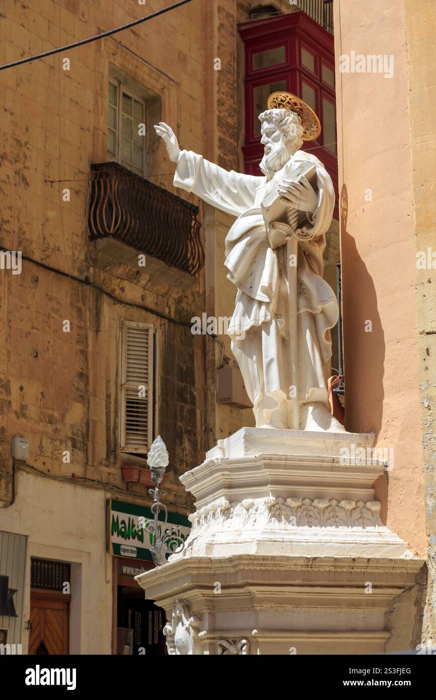 Religious statue of St Paul on the corner of St Paul's and St Lucia ...