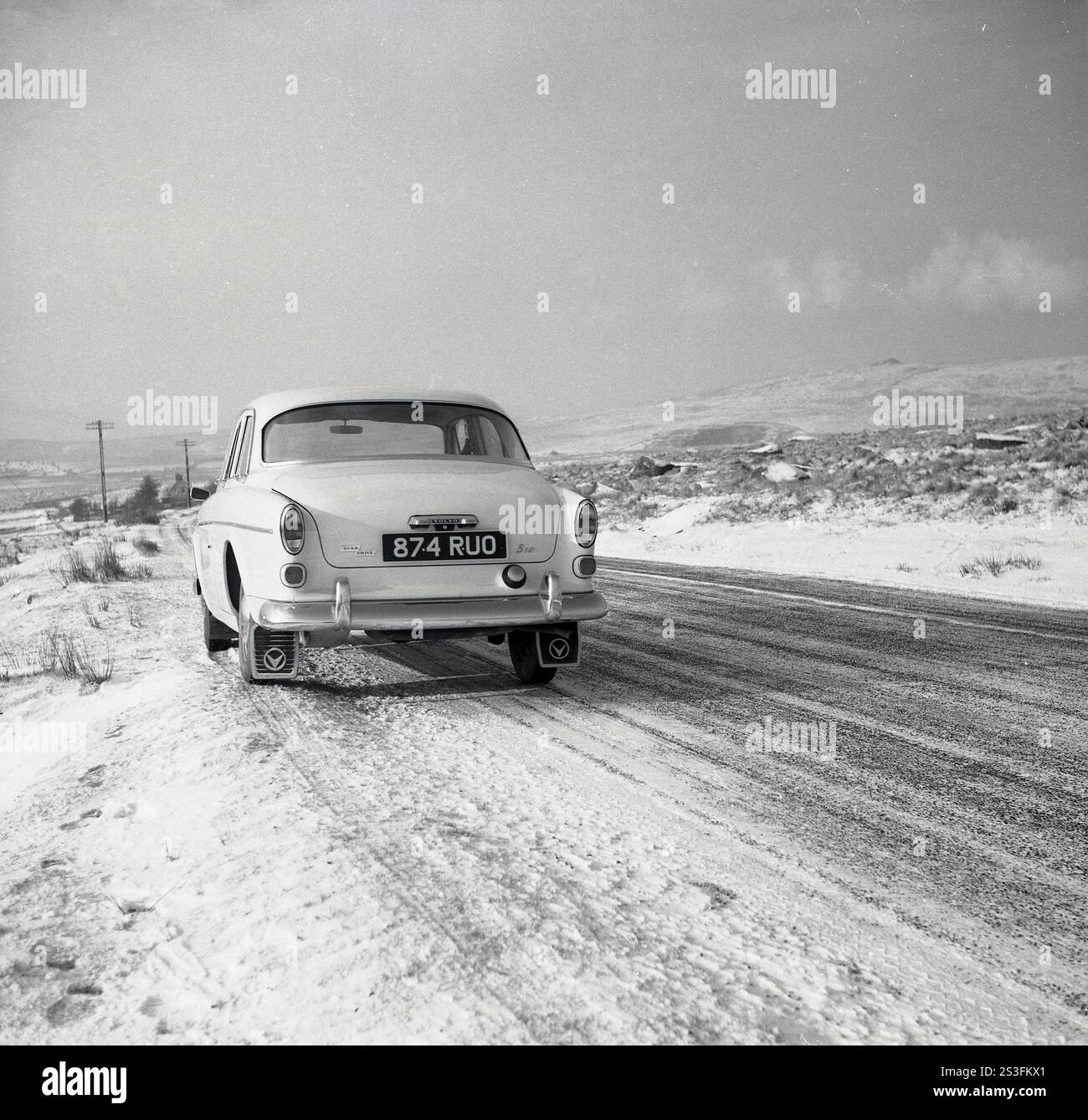 1960s, historcial, rear view of a Volvo B18 car with Over Drive, no ...