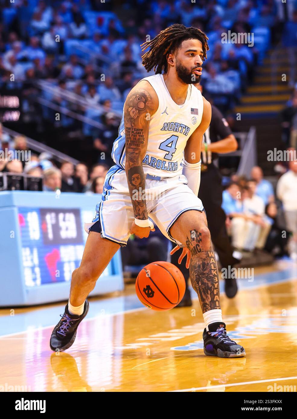 January 7, 2025: North Carolina senior RJ Davis (4) dribbles ball. NCAA ...