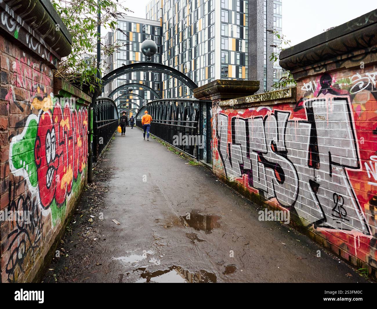 Manchester, UK, 01-04-2025: Urban street art with colorful graffiti on ...