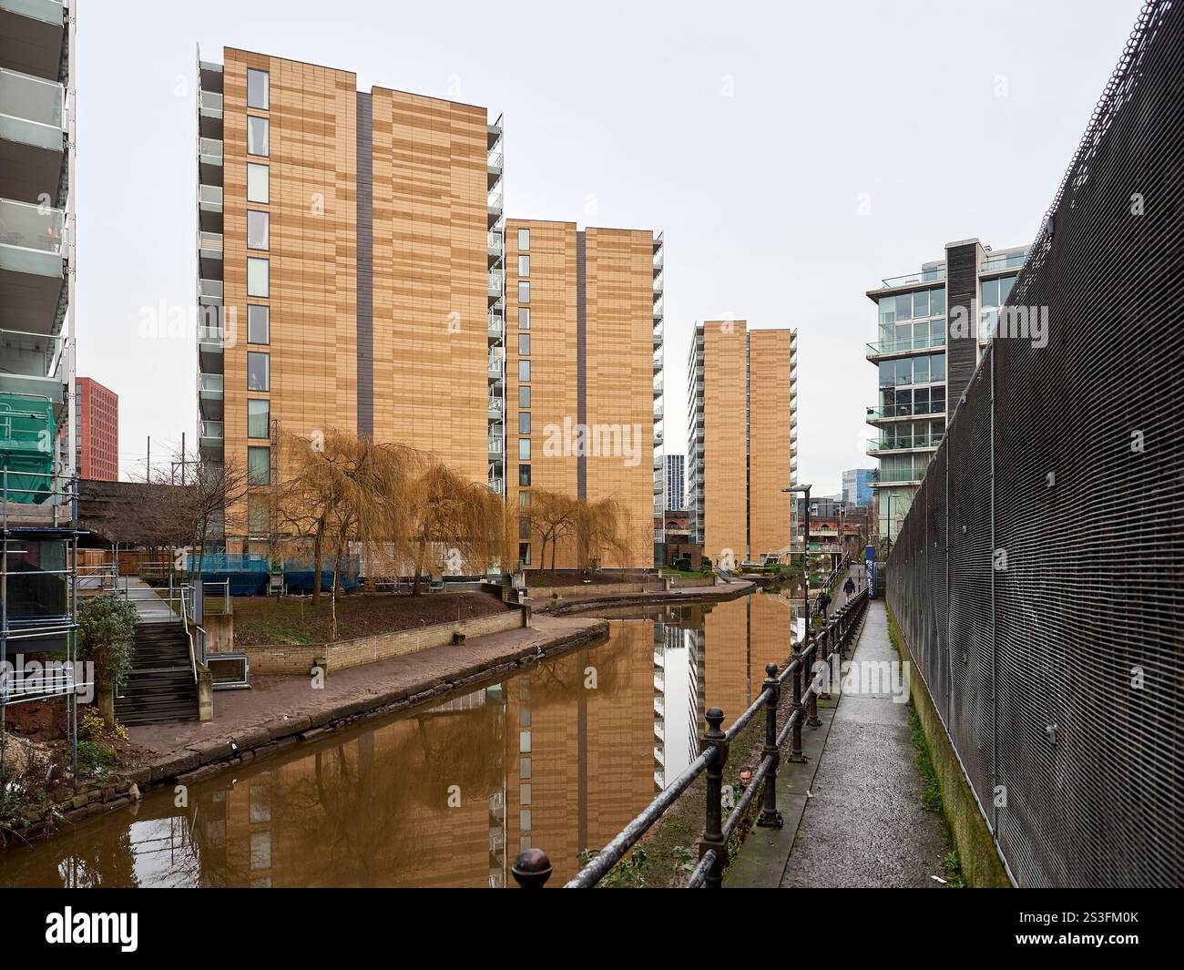 Modern high-rise buildings Salford Manchester line a tranquil urban ...
