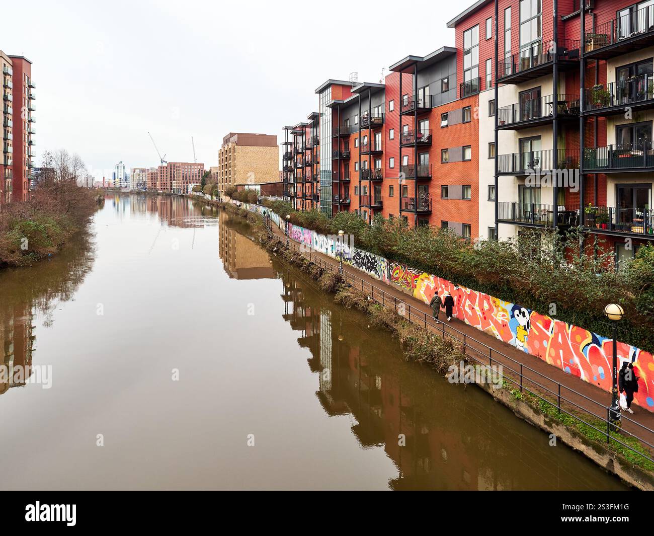 Salford , Manchester, UK, 01-04-2025: Urban riverside with colorful ...