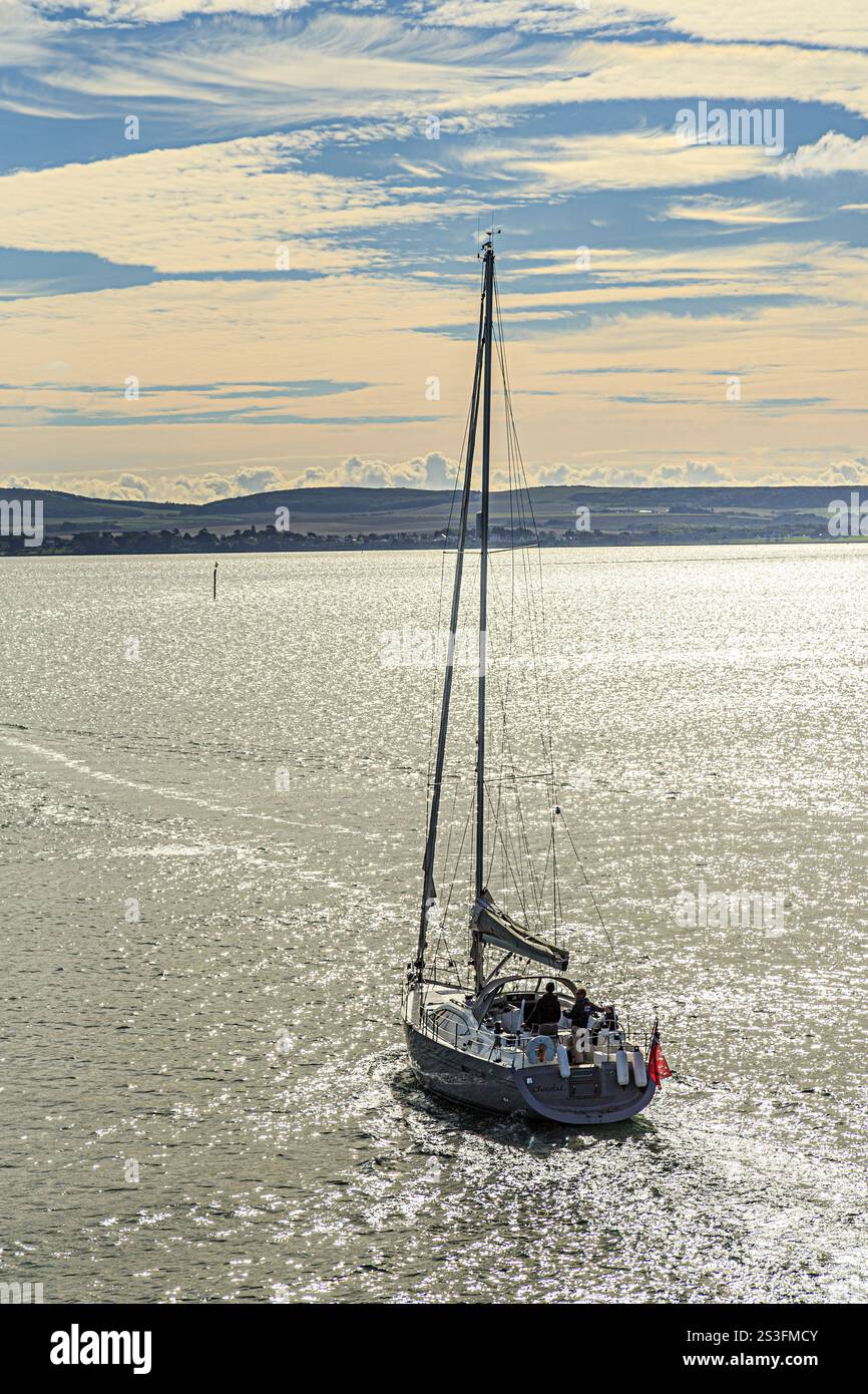 Yacht sailing out of Lymington harbour, England, UK Stock Photo - Alamy