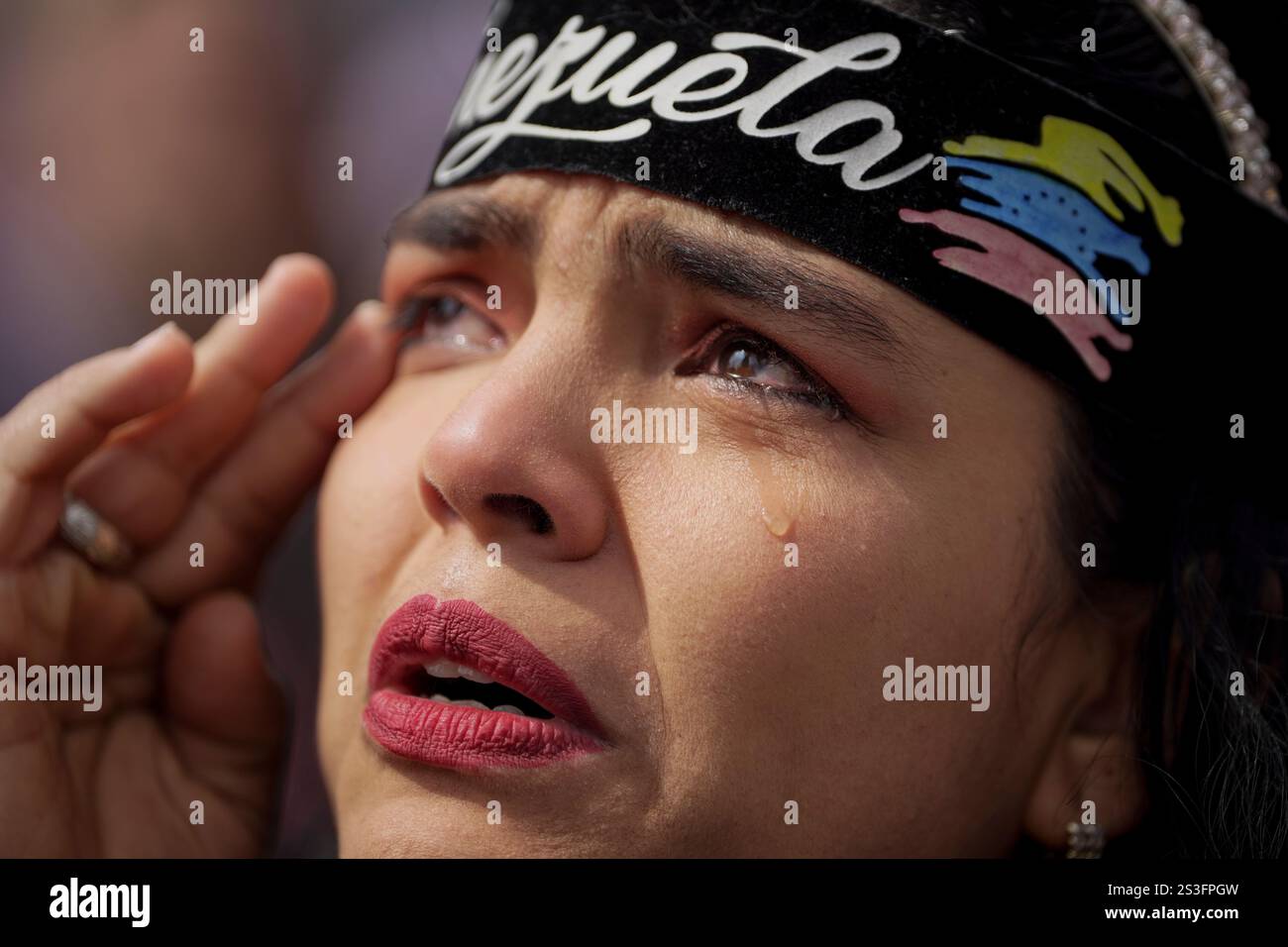 A woman cries during a protest by opponents of Venezuelan President ...