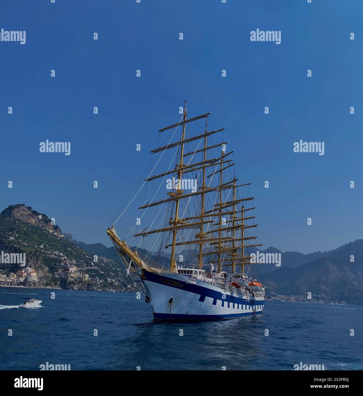 white and blue pirate ship off the Amalfi Coast in Italy Stock Photo ...