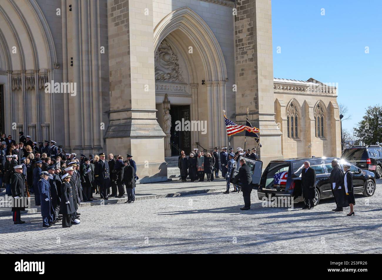 Carter family members pause as the casket bearing Former President ...