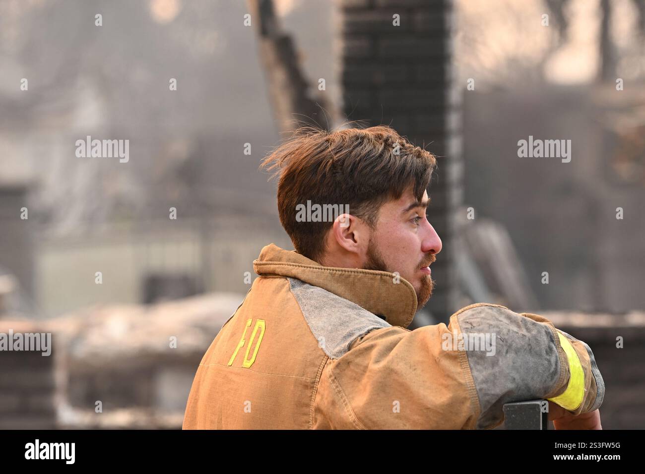 Robert Lara looks through his home that was destroyed after the Eaton ...