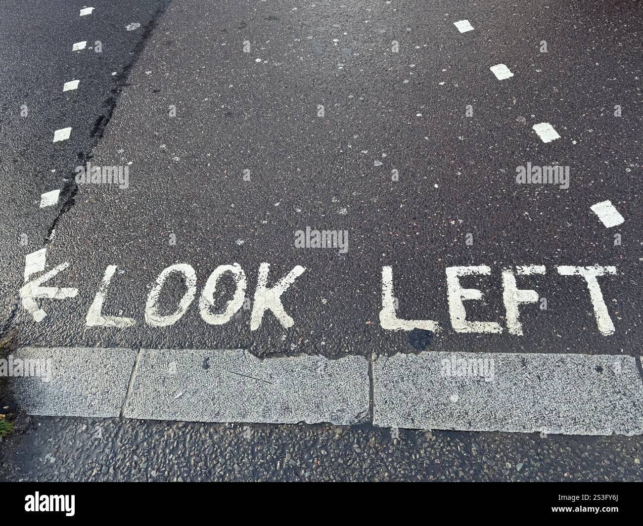 09 January 2025, Great Britain, London: The "look left" sign on a ...