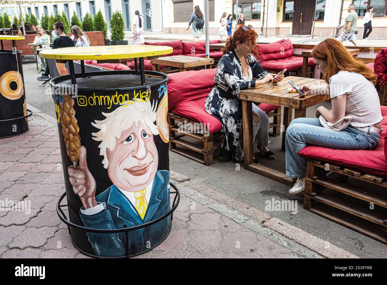 Britain's former Prime Minister Boris Johnson pictured on the tables of ...