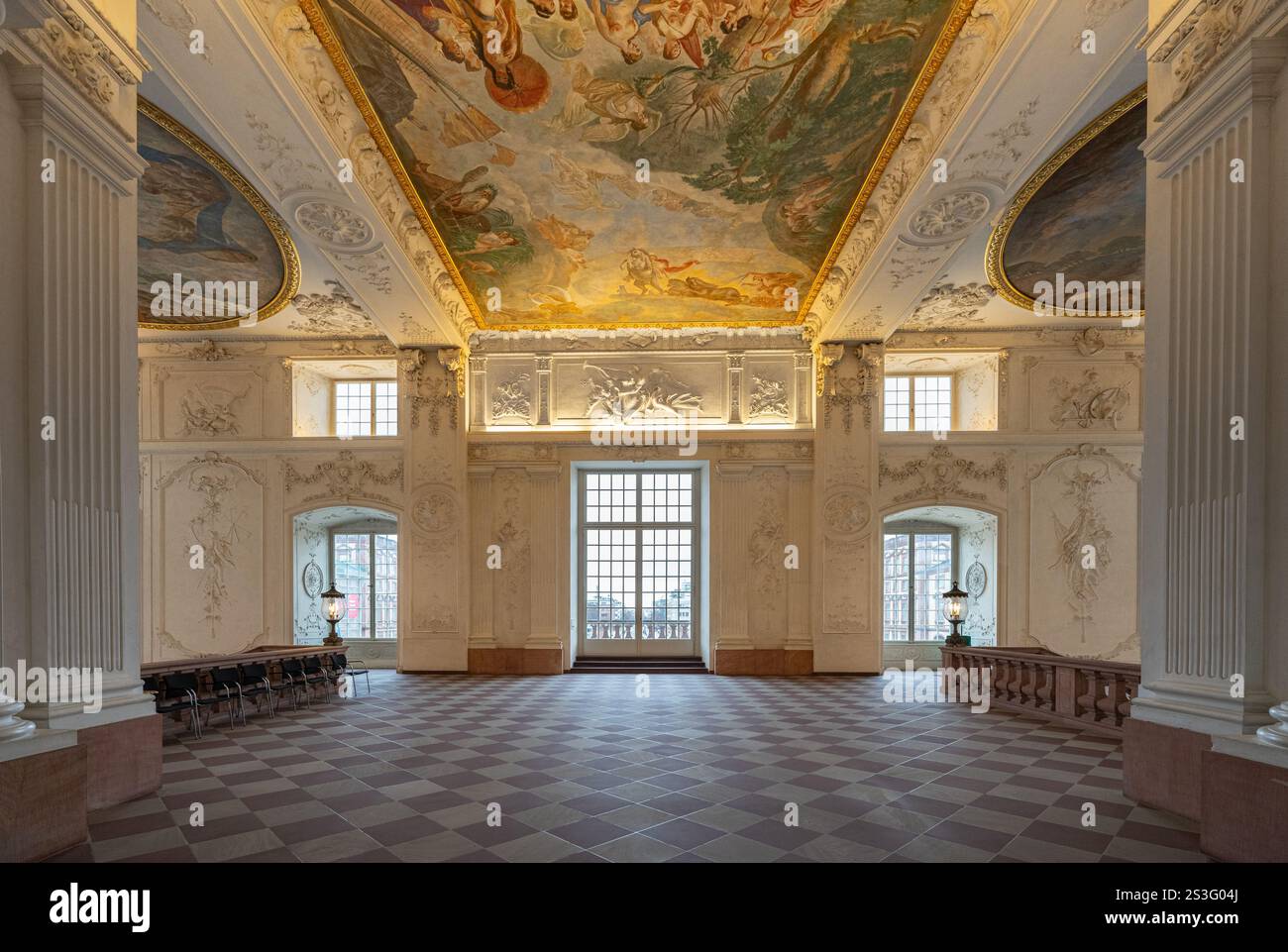 Magnificent staircase with impressive intricate stucco paintings and ceiling frescoes in the ...