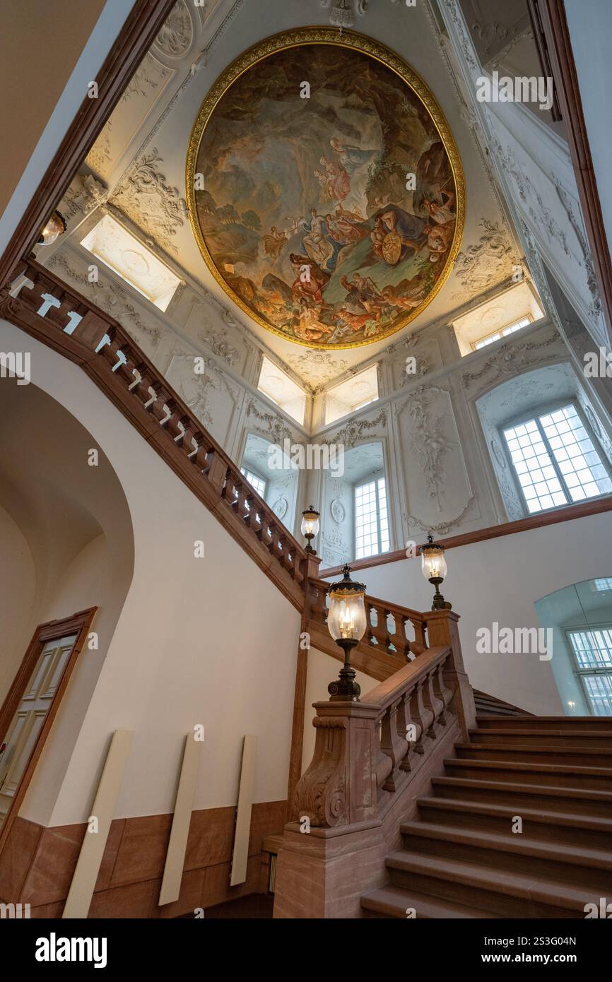 Magnificent staircase with impressive intricate stucco paintings and ...