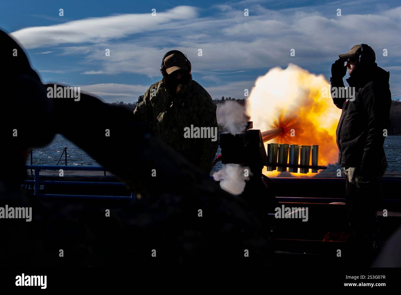 Chief Michael Marshalsea and TM1 Ian Knight fire a 40mm saluting ...
