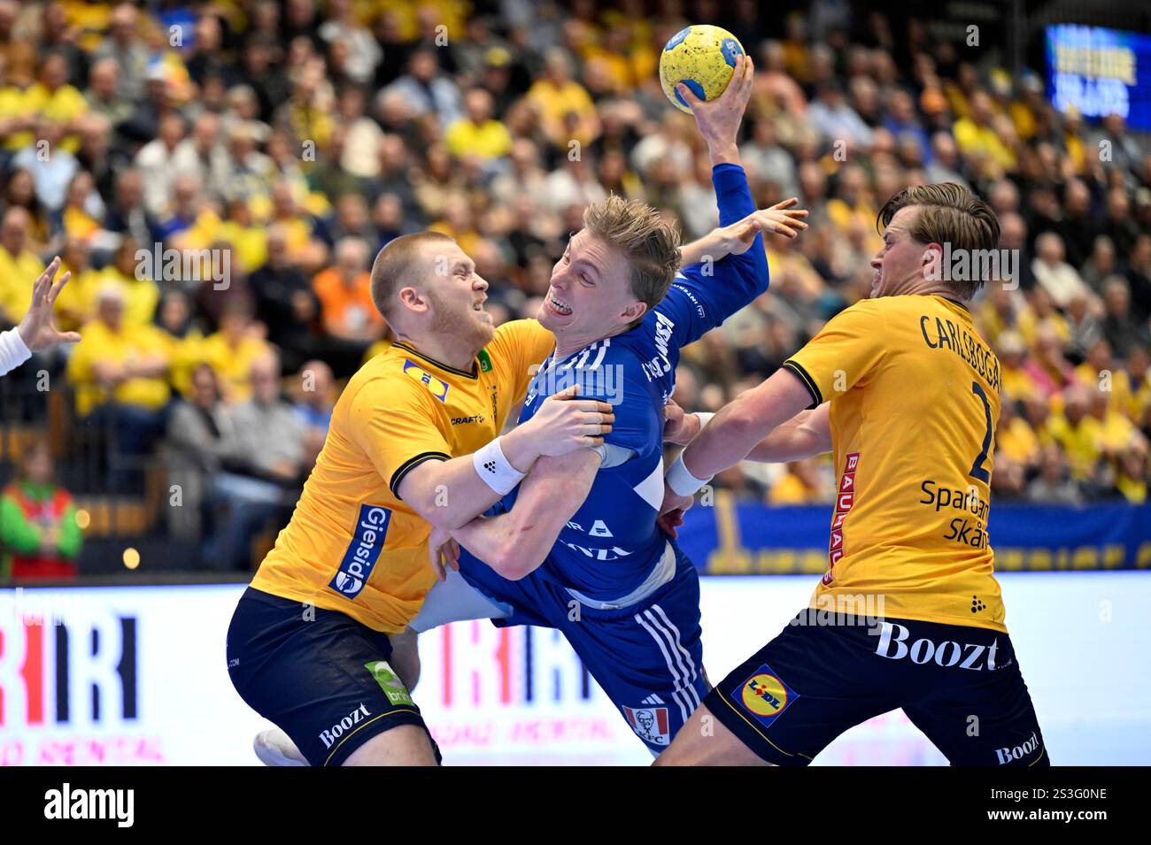 Sweden's Felix Moller, left, and Jonathan Carlsbogard challenge Iceland ...