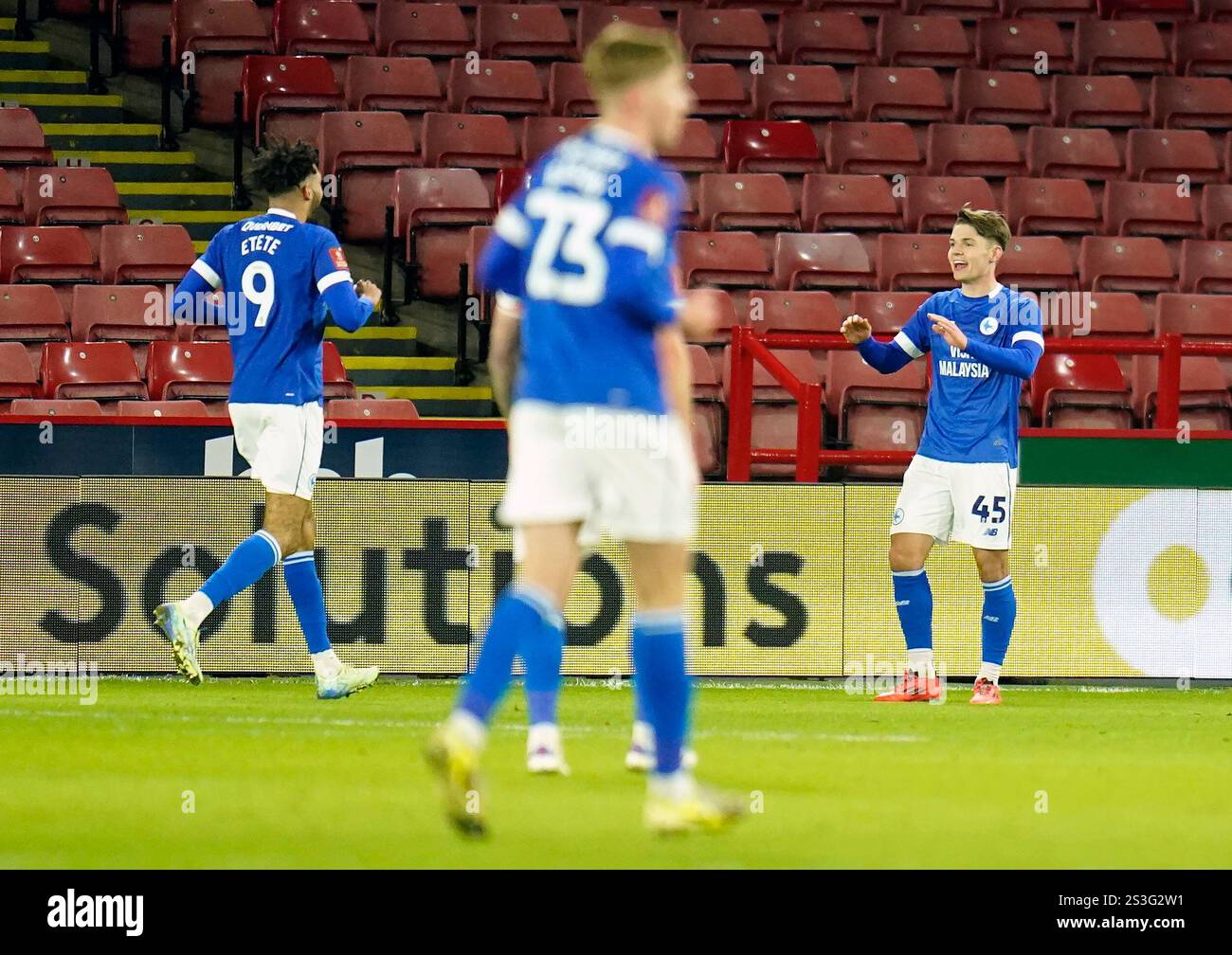 Cardiff City's Cian Ashford (right) celebrates scoring their side's ...
