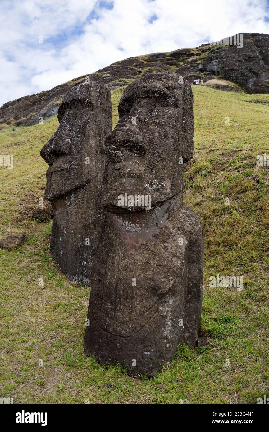Two Moai (monolithic statues) at Rano Raraku, the quarry where most ...