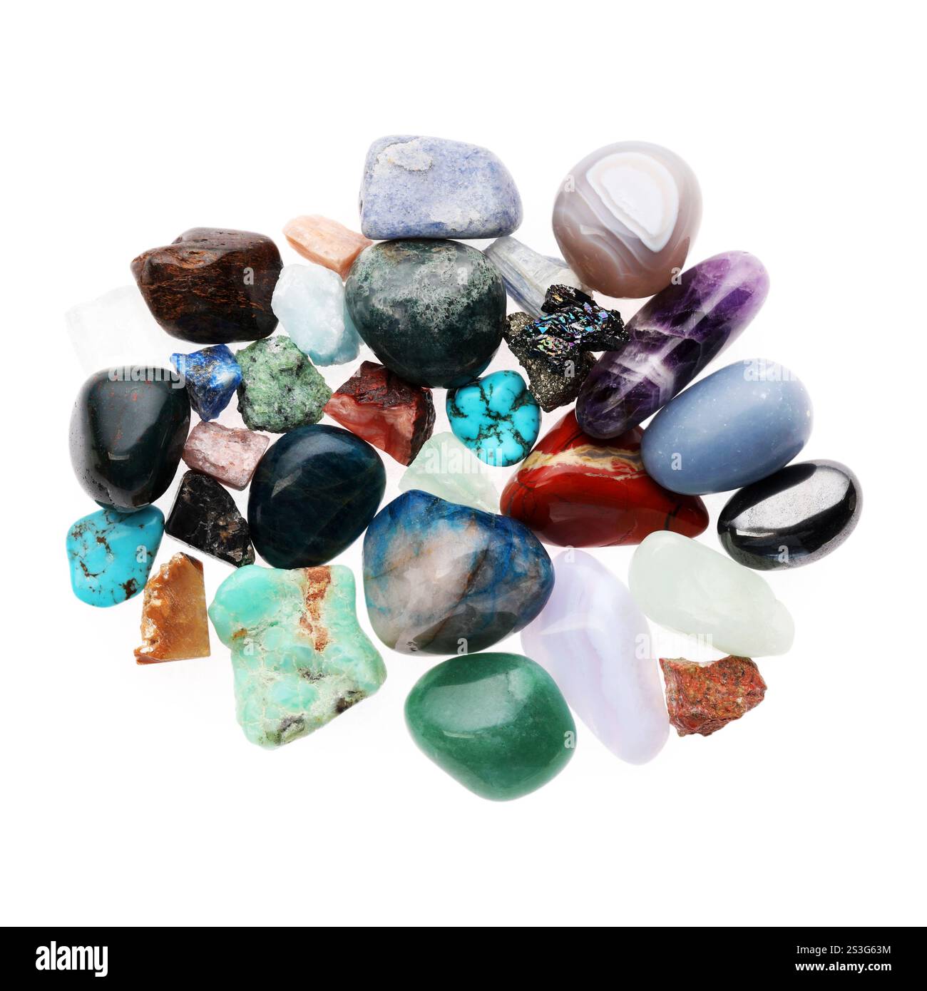Pile of different natural mineral stones isolated on white, top view ...