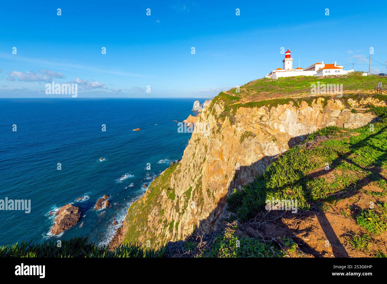 The historic lighthouse at Cabo da Roca or Cape Roca, an Atlantic ocean ...