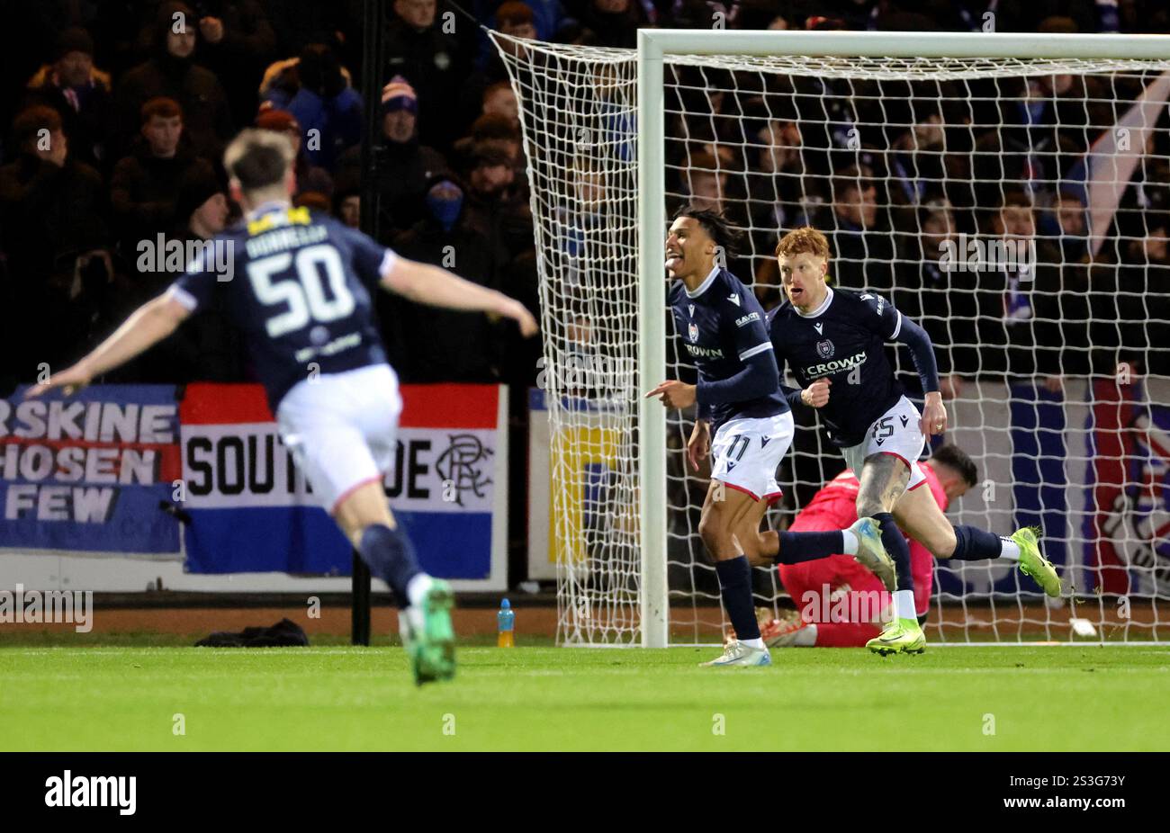 Dundee's Oluwaseun Adewumi (centre) celebrates scoring their side's ...