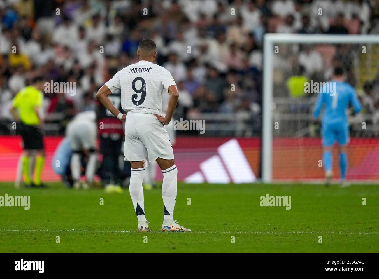 Real Madrid's Kylian Mbappe stands on the field during the Spanish ...