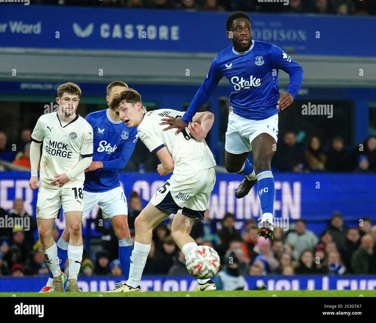 Everton's Orel Mangala (right) and Peterborough United's George Nevett ...