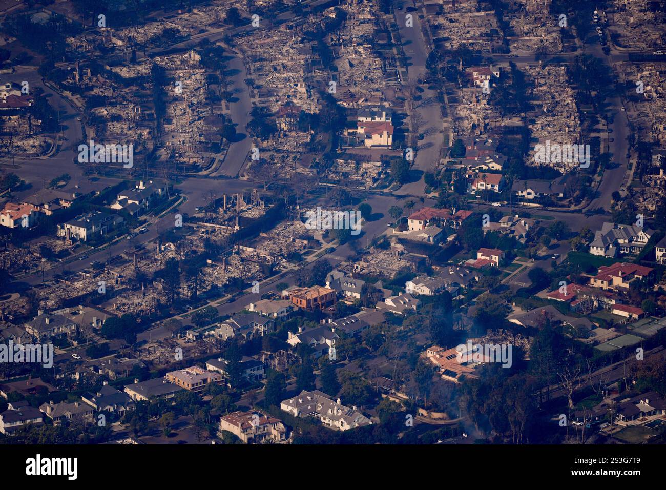 The devastation from the Palisades Fire is seen from the air in the ...
