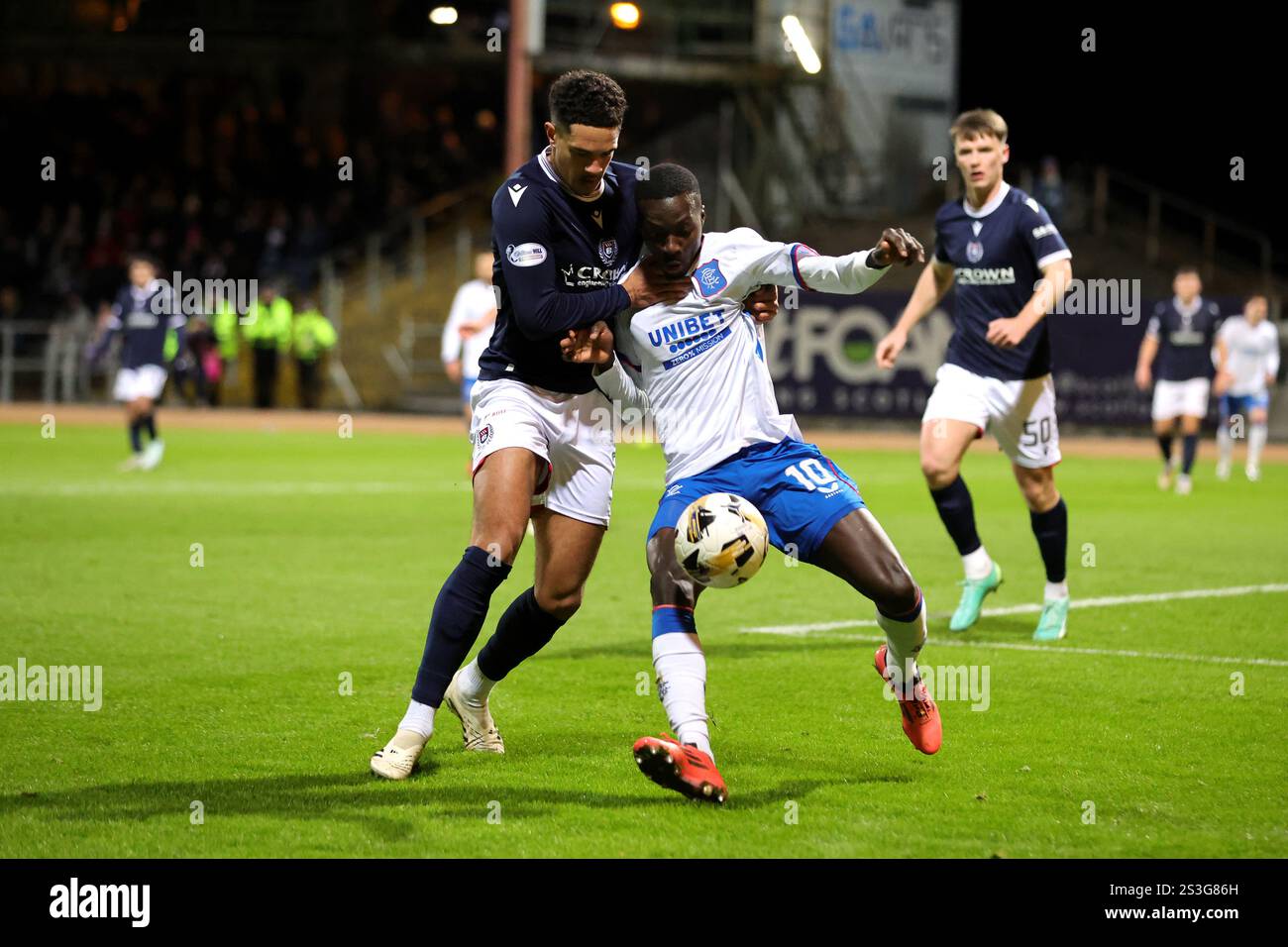 Rangers' Mohamed Diomande (right) and Dundee's Ethan Ingram battle for ...