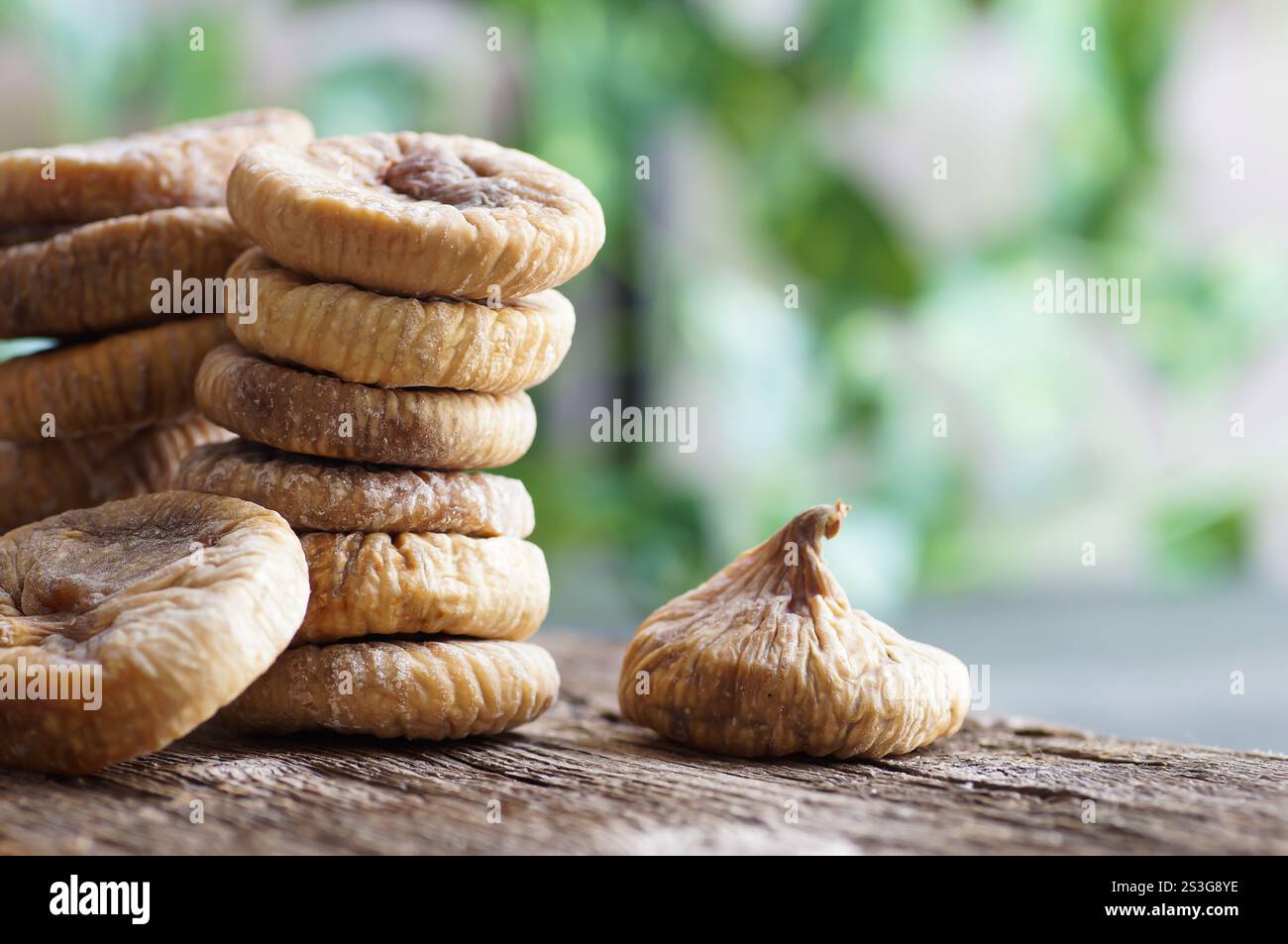 Sun dried figs on rustic table, organic tasty fruits, healthy dry fruit ...