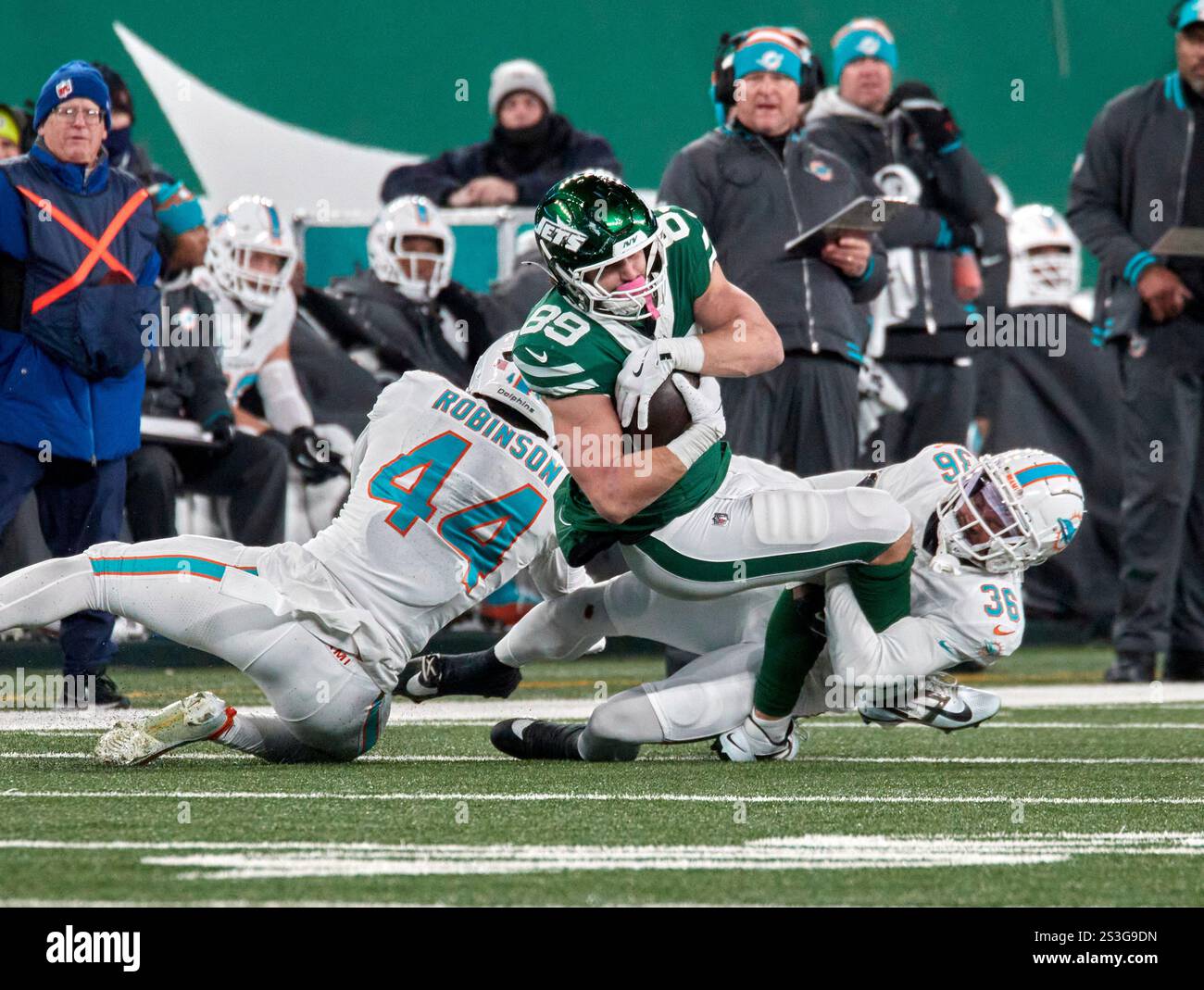 New York Jets tight end Jeremy Ruckert (89) is tackled by Miami ...