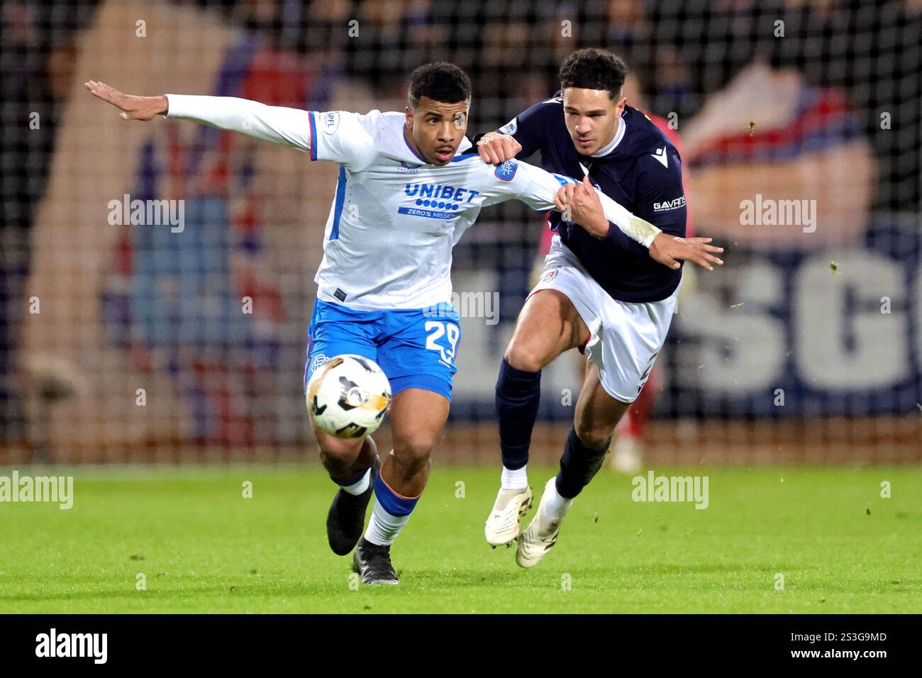 Rangers' Hamza Igamane (left) and Dundee's Ethan Ingram battle for the ...