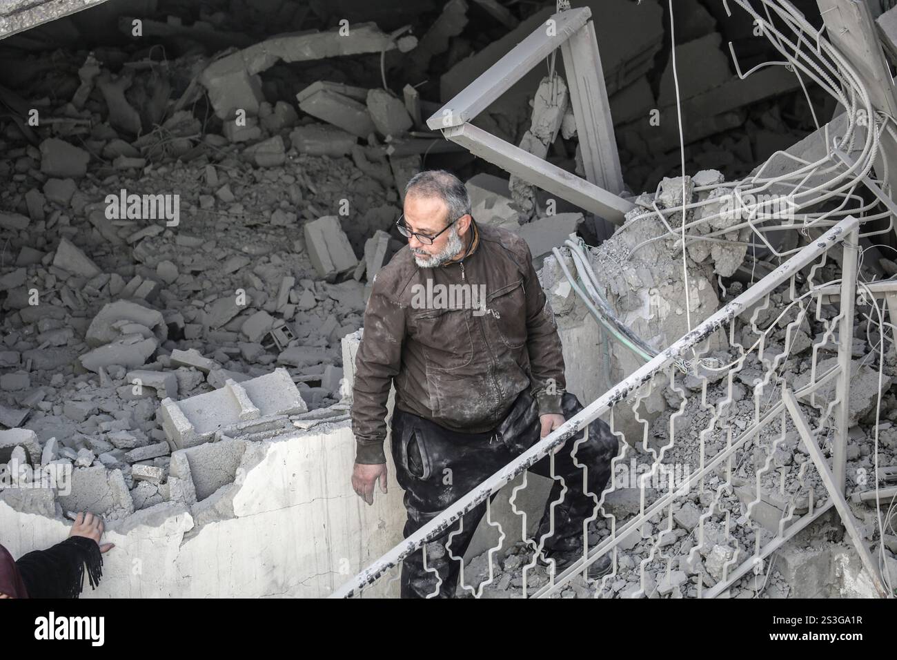 Tulkarm, Palestine. 09th Jan, 2025. Palestinian seen a damaged building ...