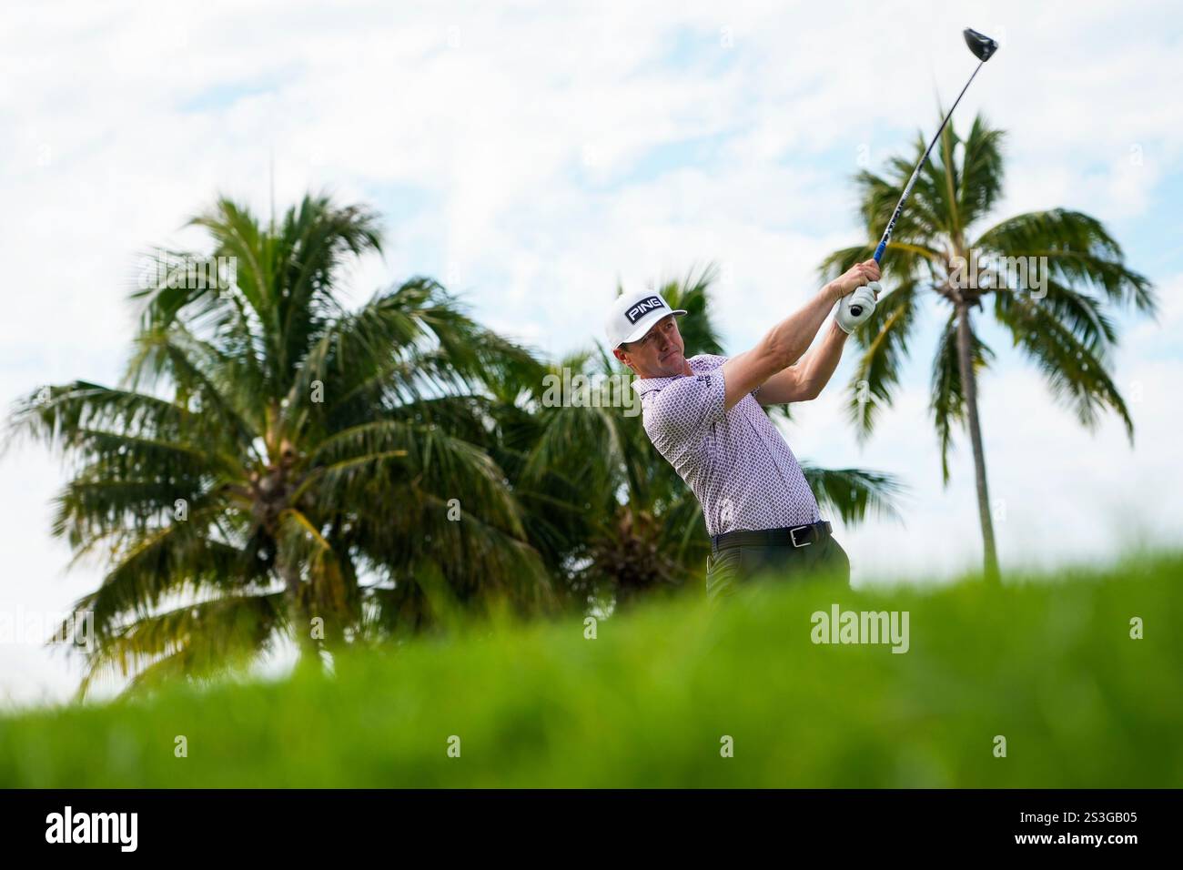 Mackenzie Hughes, of Canada, hits on the 14th hole during the first ...