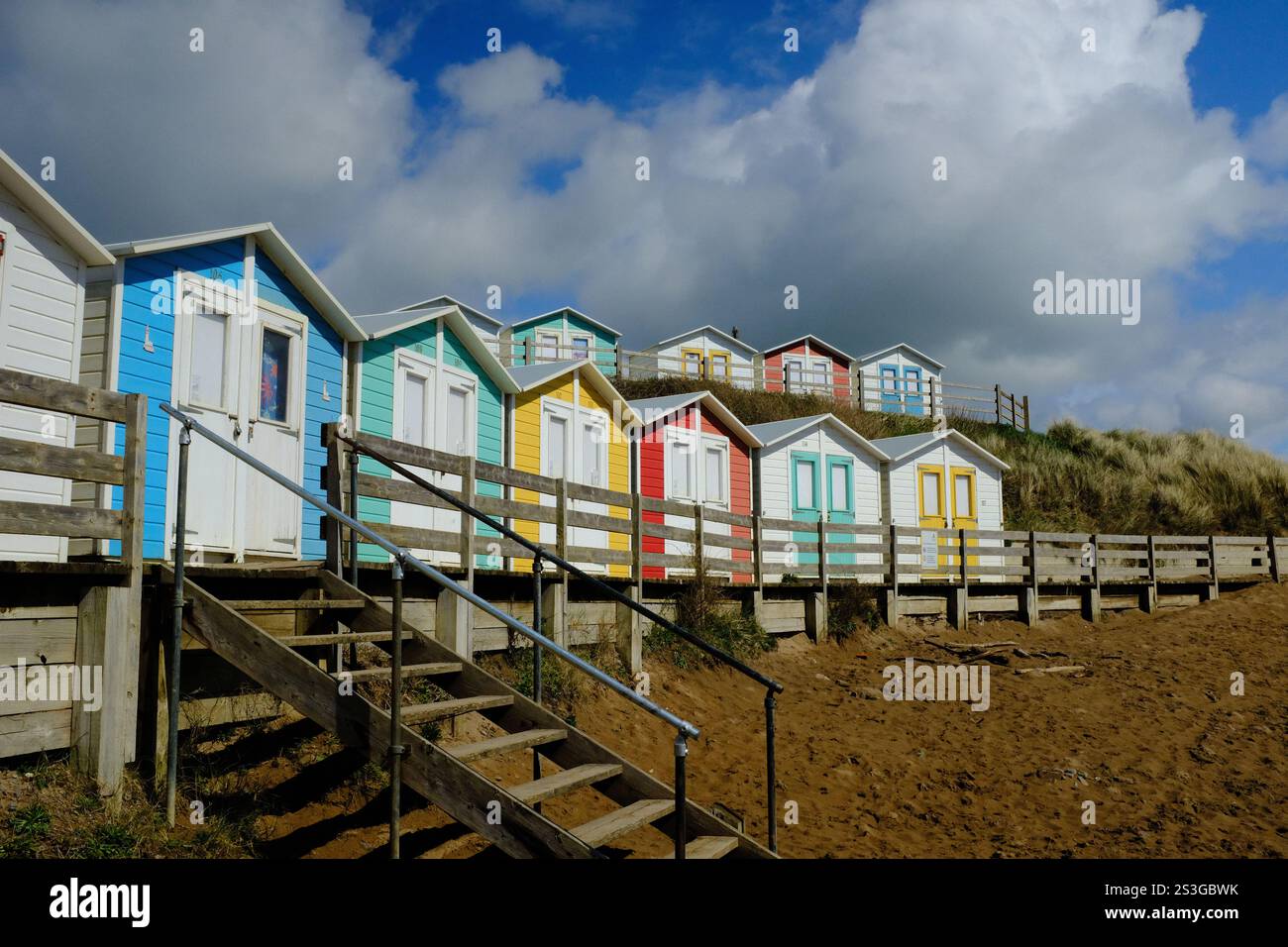 Colourful beach houses in Cornwall Stock Photo - Alamy