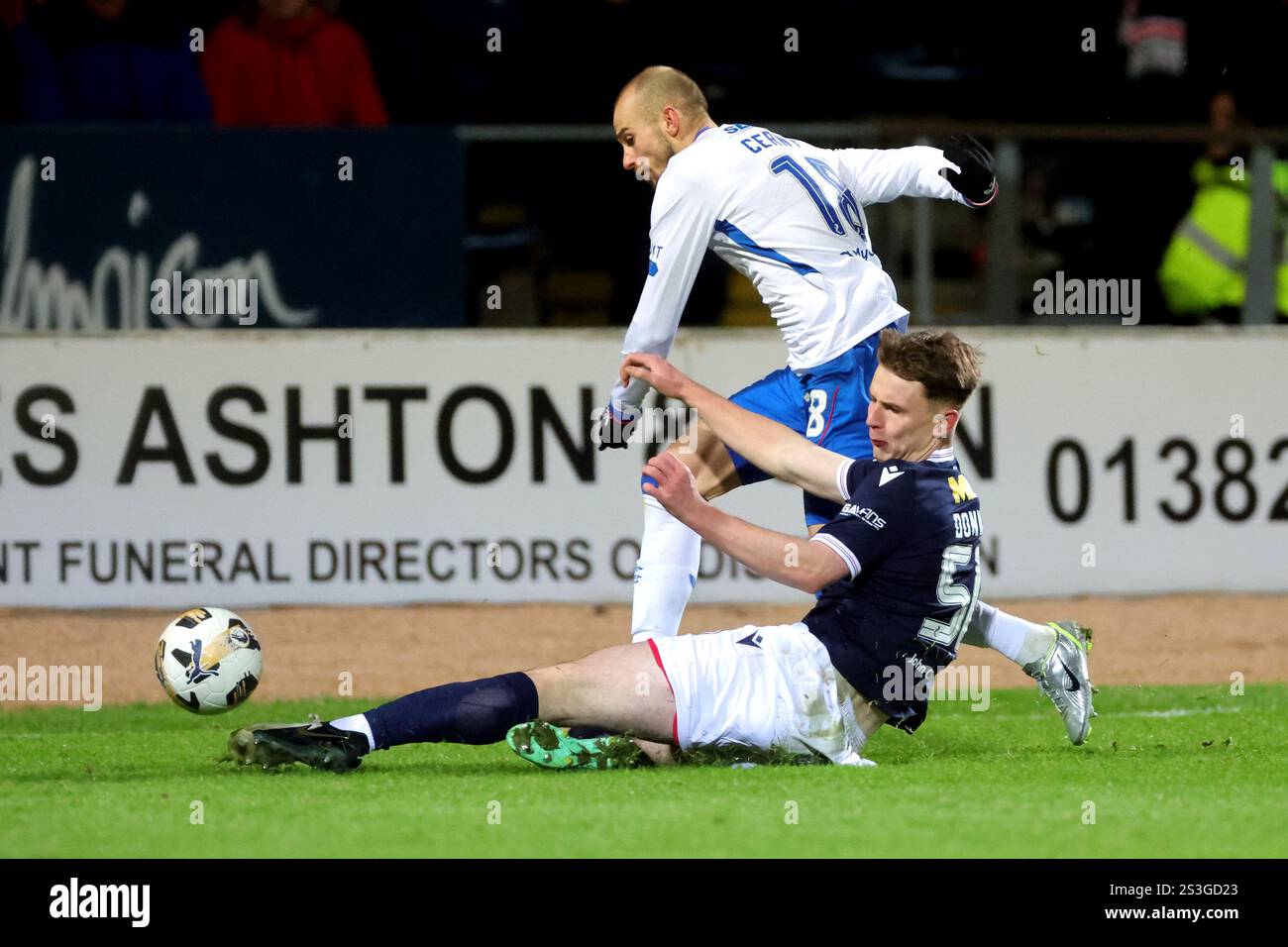 Dundee's Aaron Donnelly (right) challenges Rangers' Vaclav Cerny during ...
