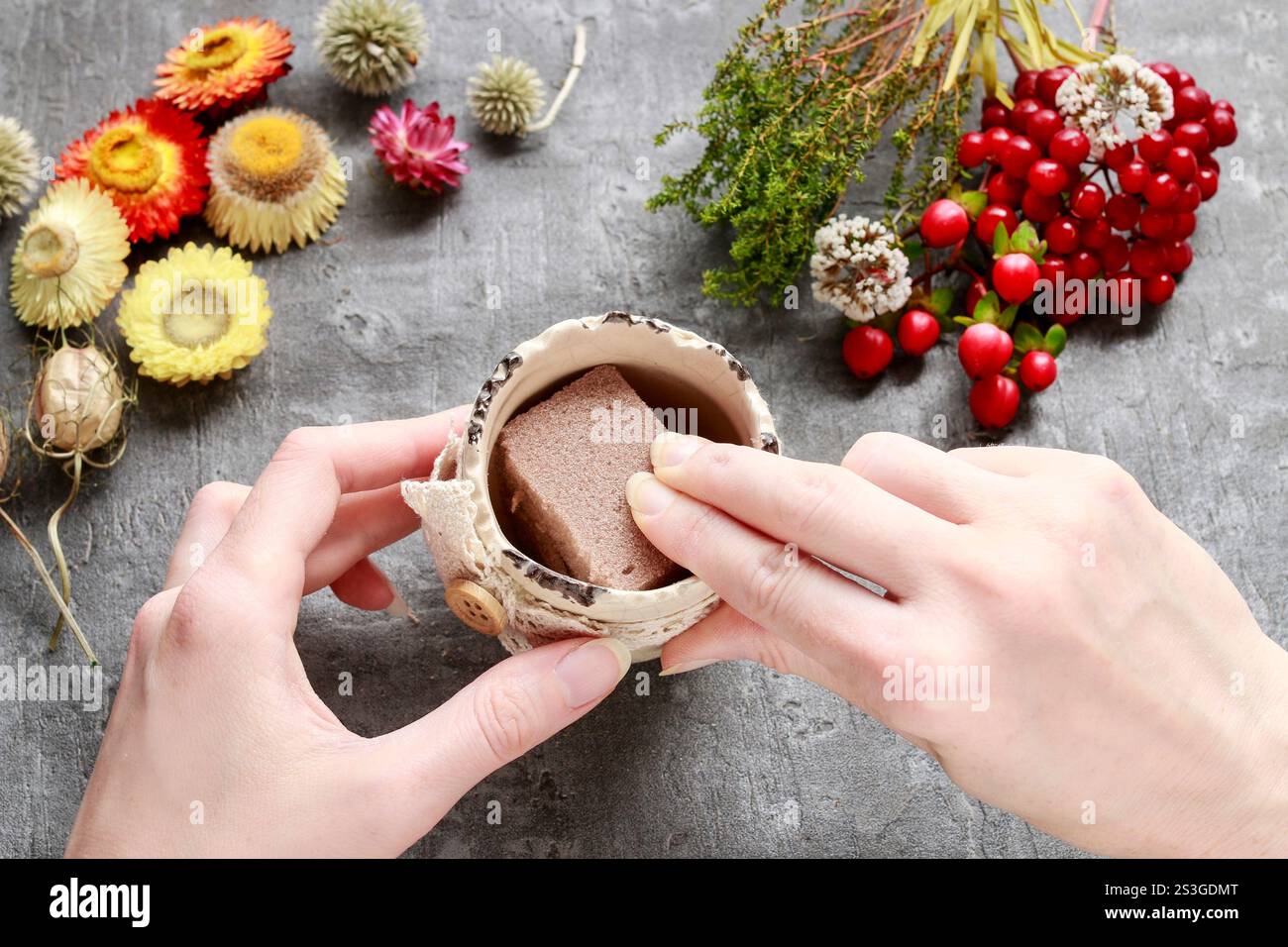 Florist workspace: how to make floral arrangement with dry plants and ...