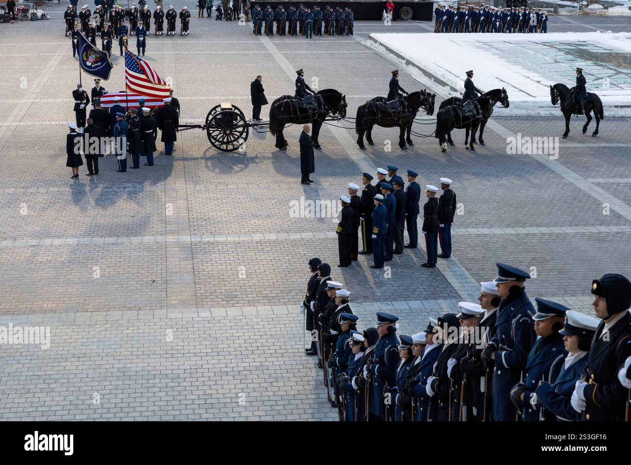 The casket of former US President Jimmy Carter arrives on a horse-drawn ...