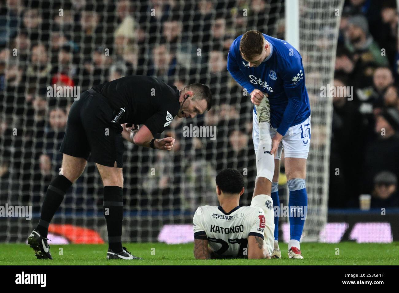 Liverpool, UK. 09th Jan, 2025. Jake O'Brien of Everton helps Jadel ...