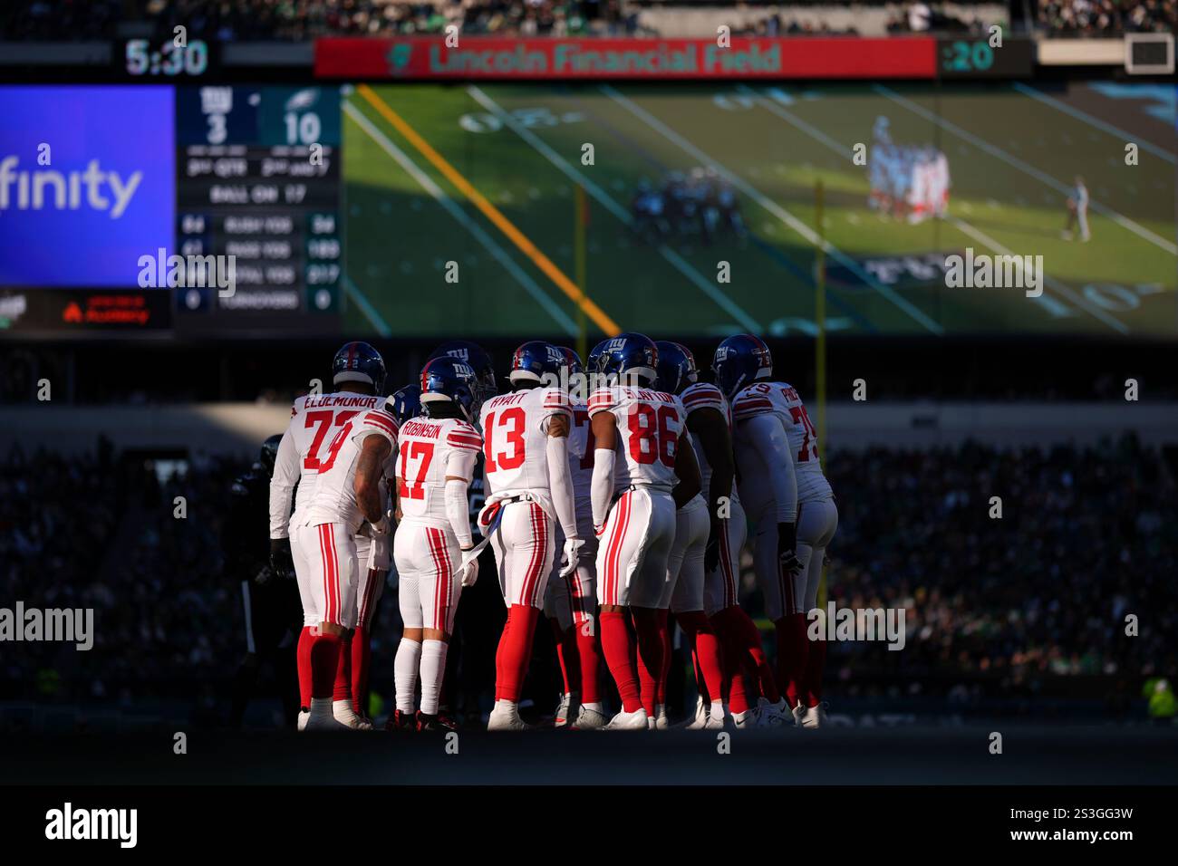 New York Giants players huddle during an NFL football game against the Philadelphia Eagles ...