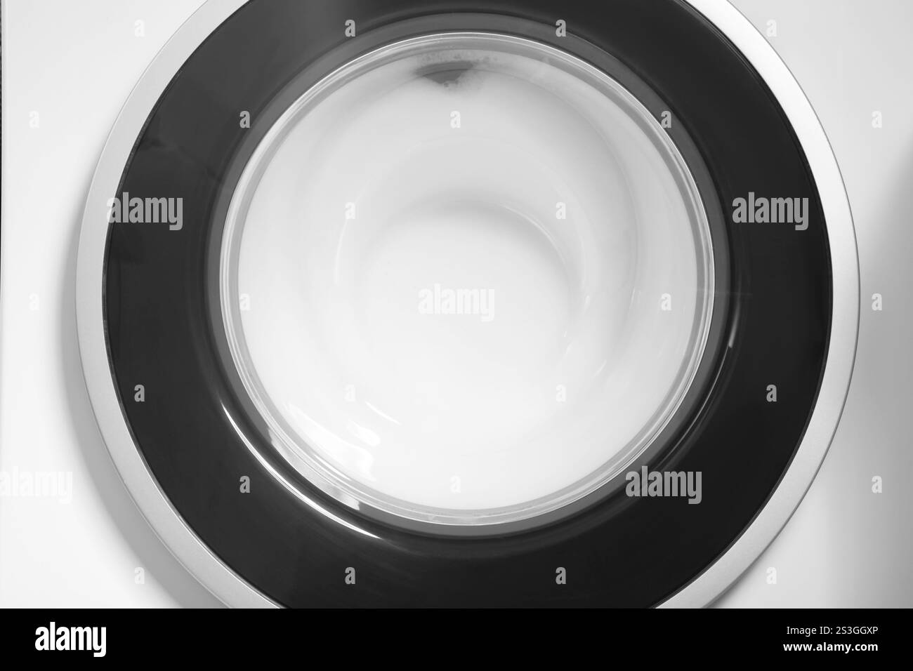 Washing machine with suds as background, closeup Stock Photo - Alamy