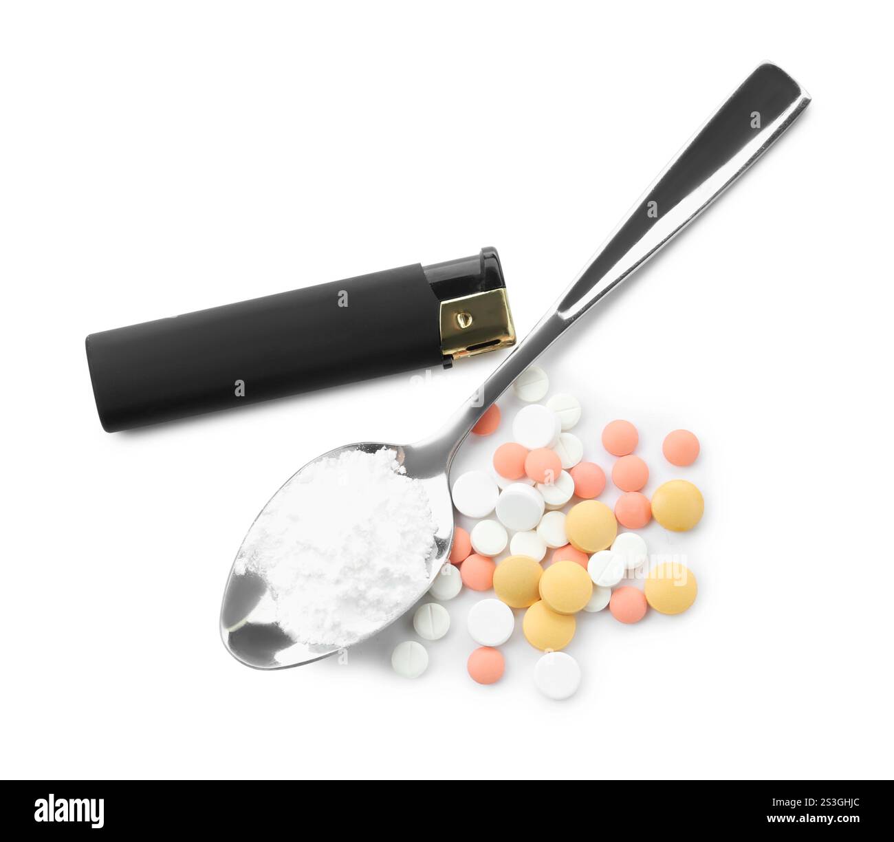 Drug addiction. Different pills, spoon with powder and cigarette ...