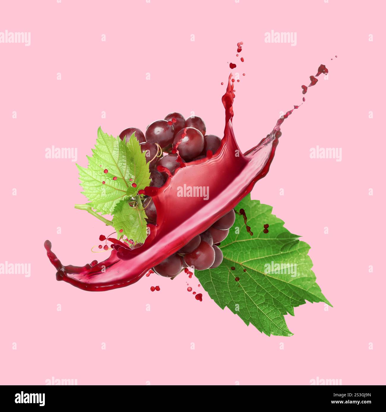 Grapes and splash of juice in air on pink background Stock Photo - Alamy