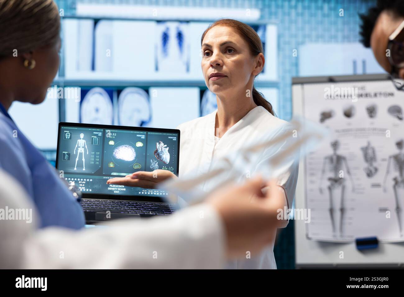 Radiologists doctors analyzing cardiology scans to detect heart ...