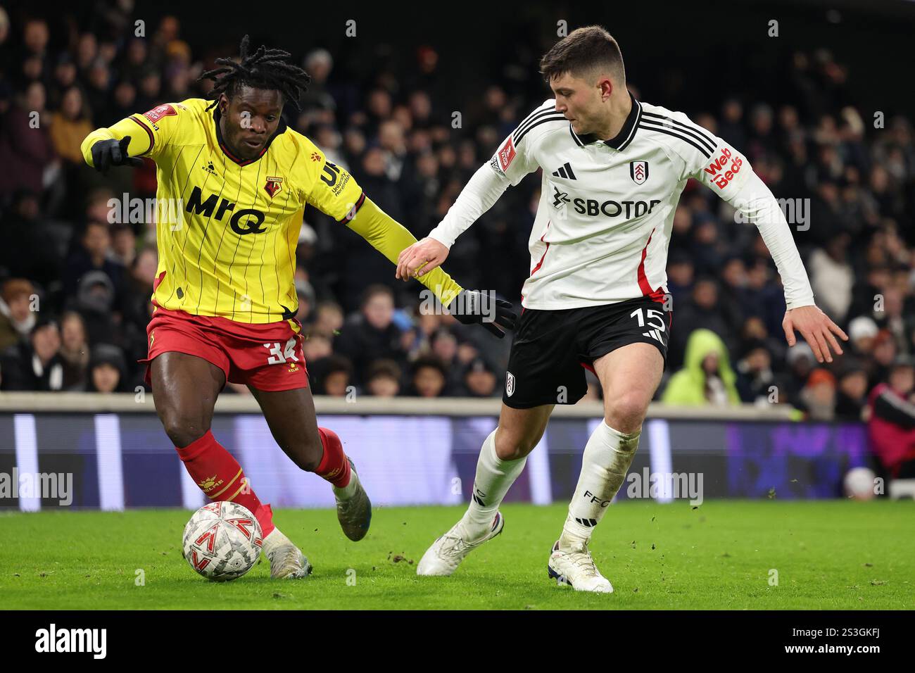 London, UK. 9th Jan, 2025. Kwadwo Baah of Watford and Jorge Cuenca of ...