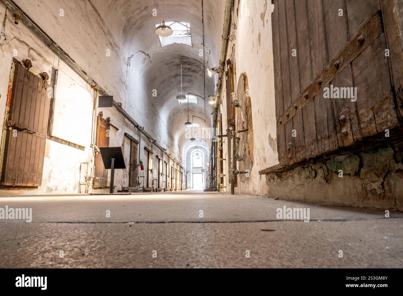 Floor level point of view of a lit cellblock of Eastern State ...