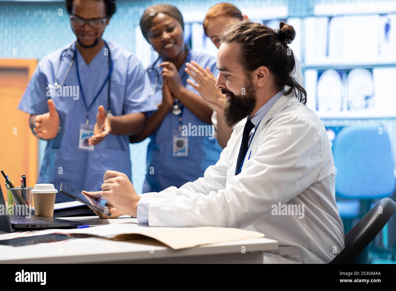 Cheerful confident doctors and nurses finding right treatment plan for ...