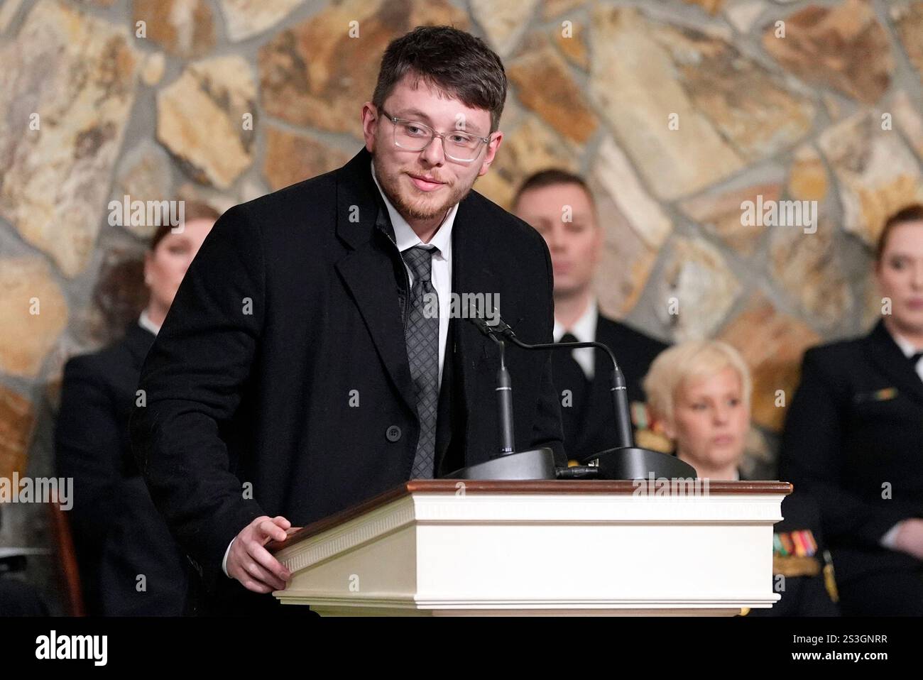 Hugo Wentzel reads scripture during the funeral service for former ...