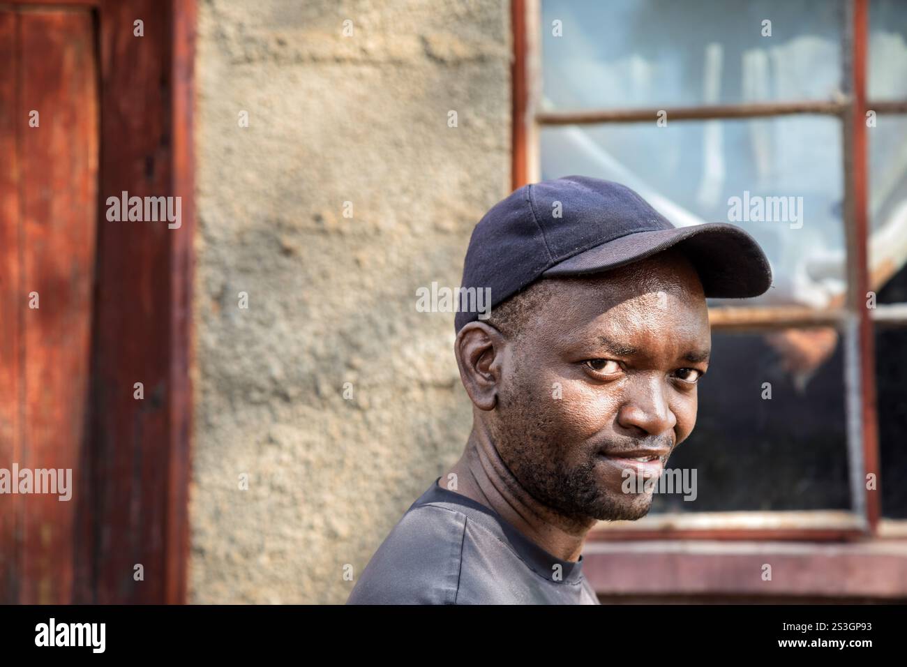 african village, portrait single smiling african man with a beard and ...