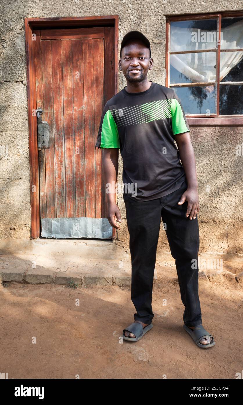 african village, portrait single smiling african man full length, on ...