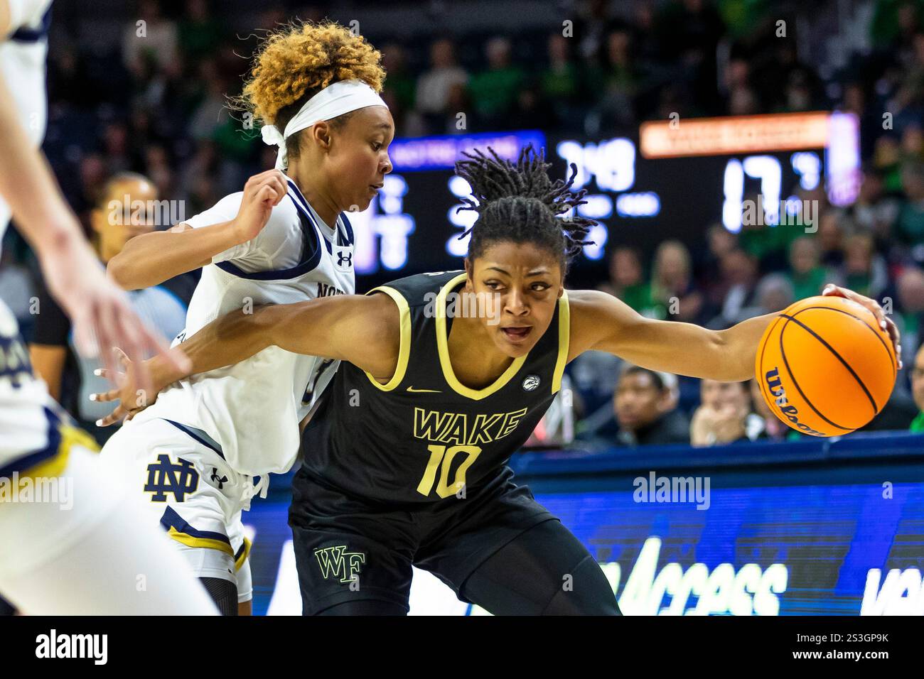 Wake Forest guard Tamia Jones (10) drives as Notre Dame guard Hannah ...